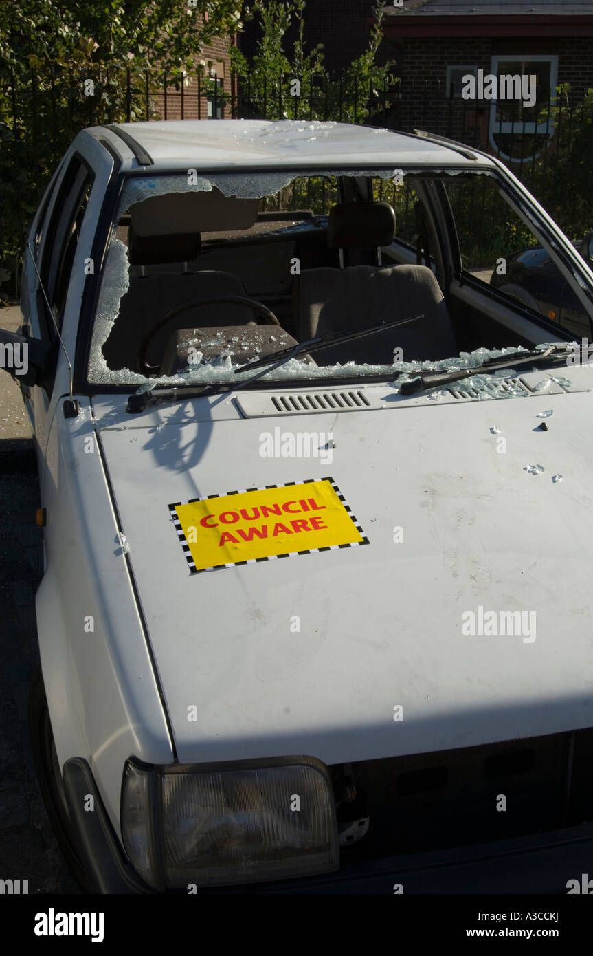 old white car wrecked and broken into with window smashed london ...