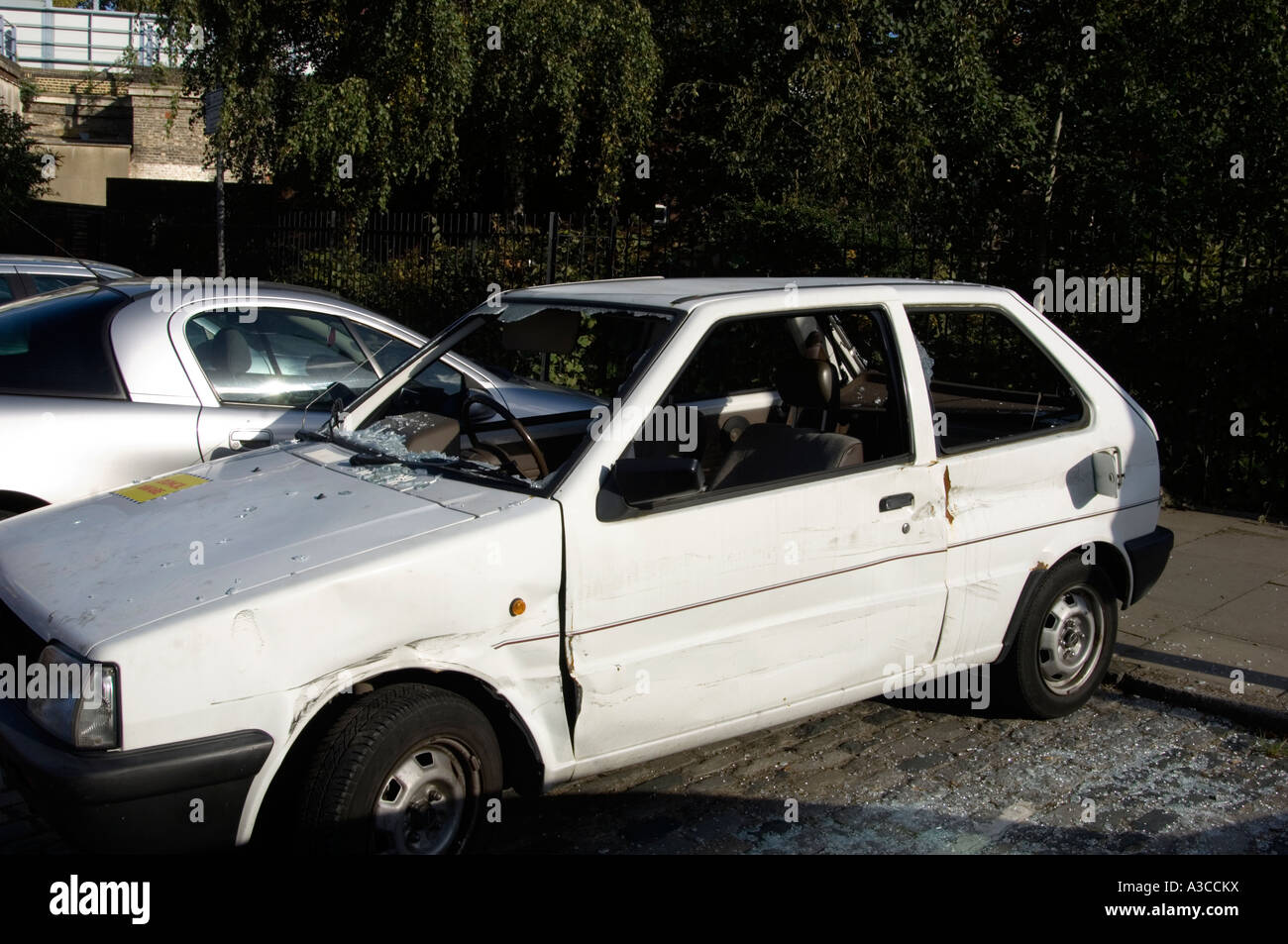 old white car wrecked and broken into with window smashed london ...