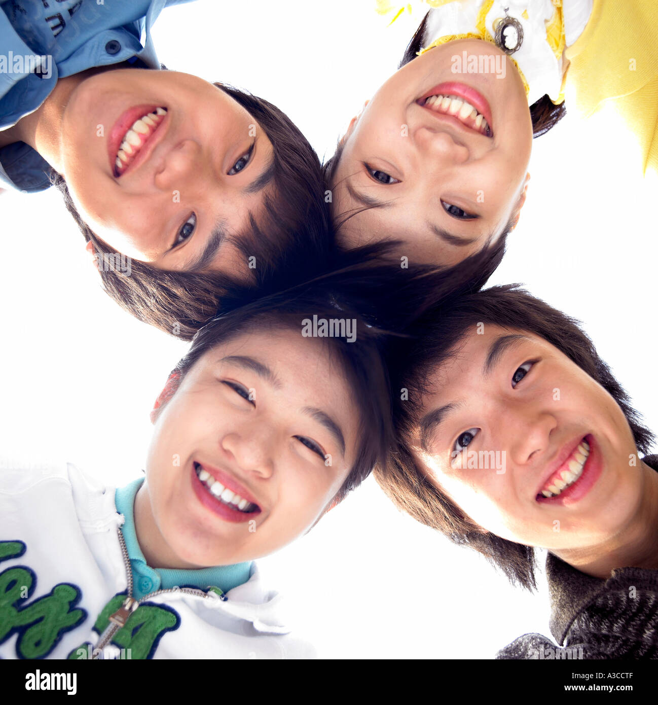 A group of students looking down on the camera together Stock Photo - Alamy