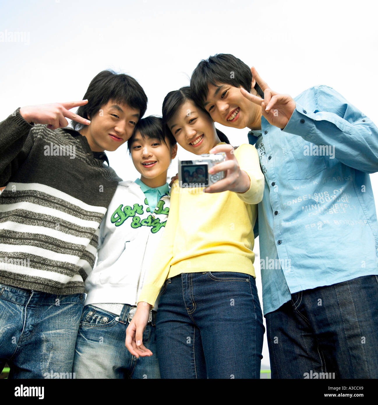A group of students taking their own photo Stock Photo - Alamy