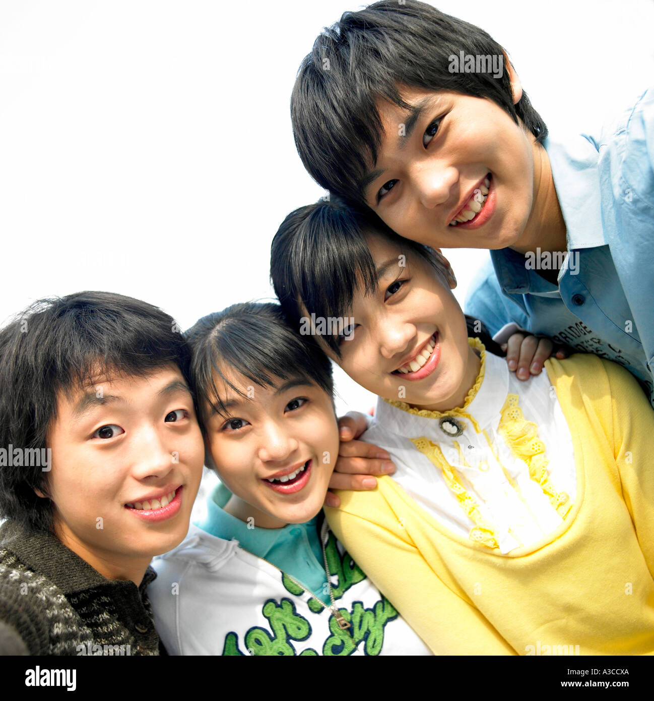 A group of students looking down on the camera together Stock Photo - Alamy