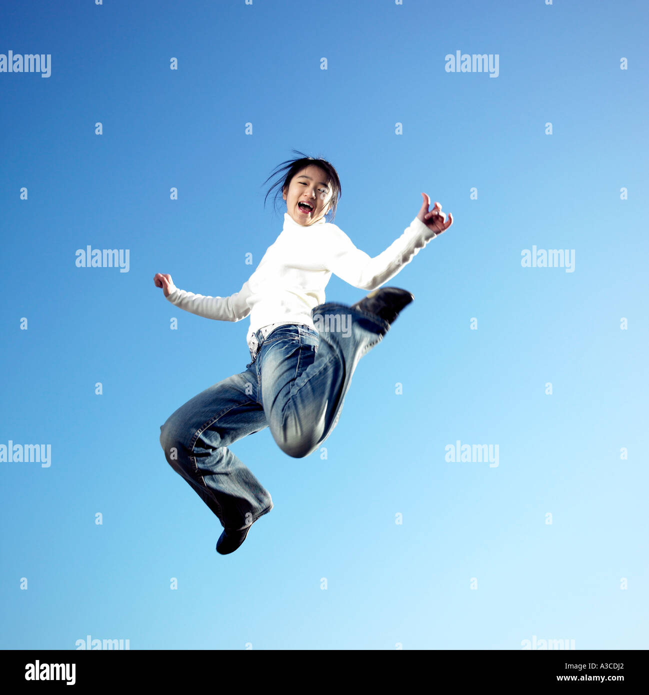 Low angle portrait cheerful asian hi-res stock photography and images ...