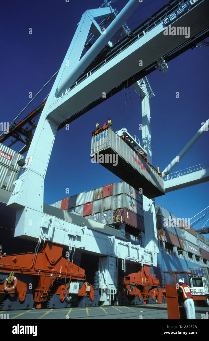 crane loading 40 foot ship containers on to container ship Port of ...