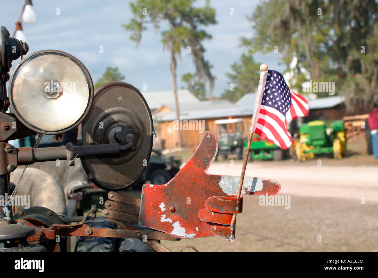 Old Timer with American Flag at Old-Timer farm implements and antique ...
