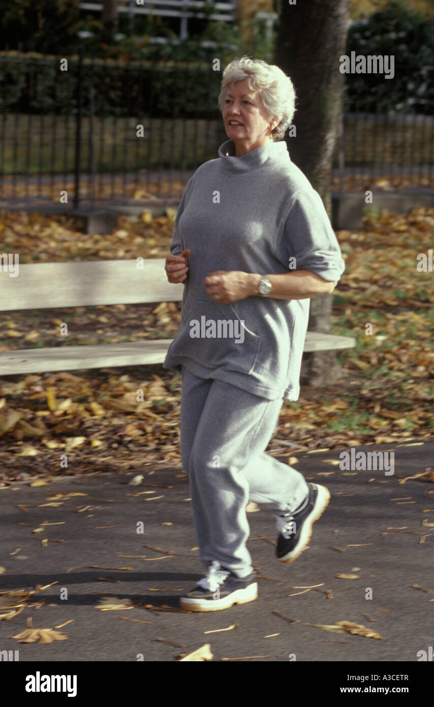 middle aged woman jogging Stock Photo - Alamy