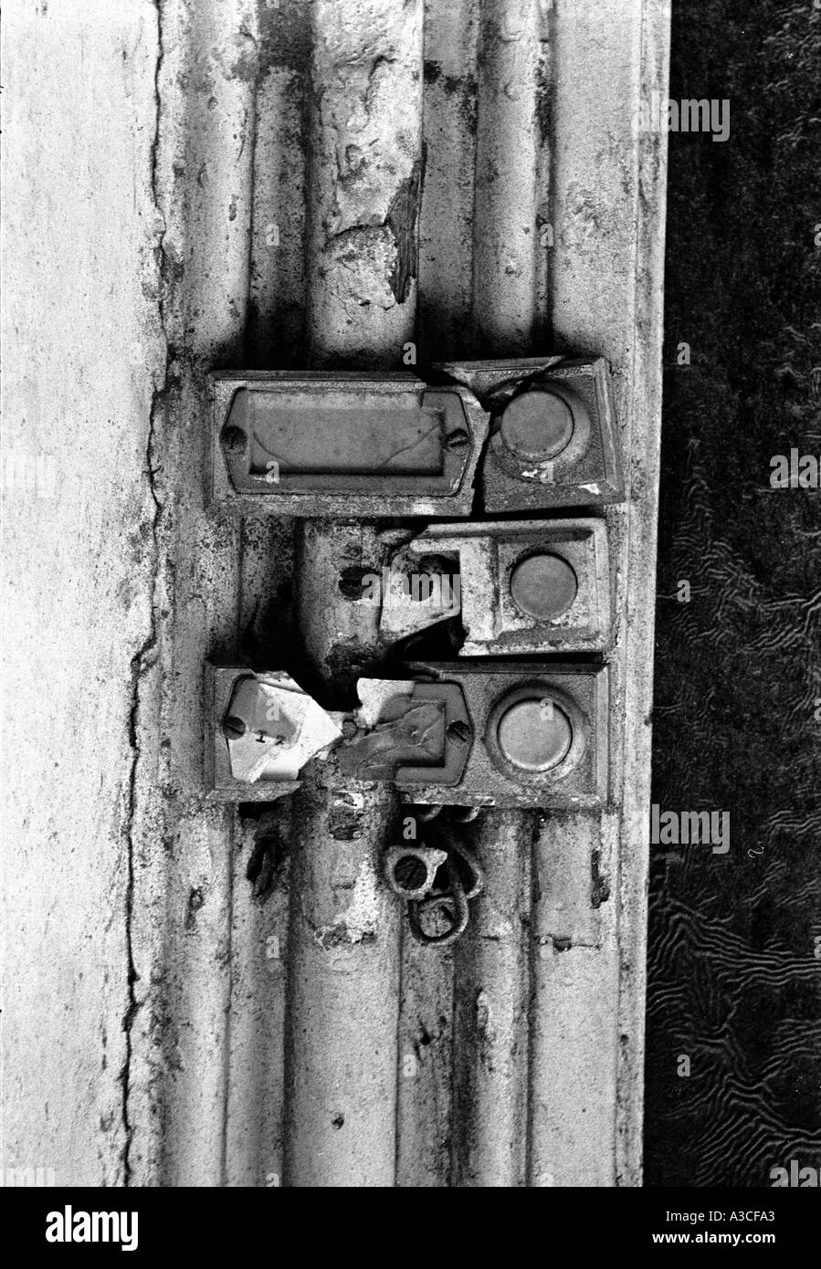 Broken bell push on building awaiting demolition Stock Photo - Alamy