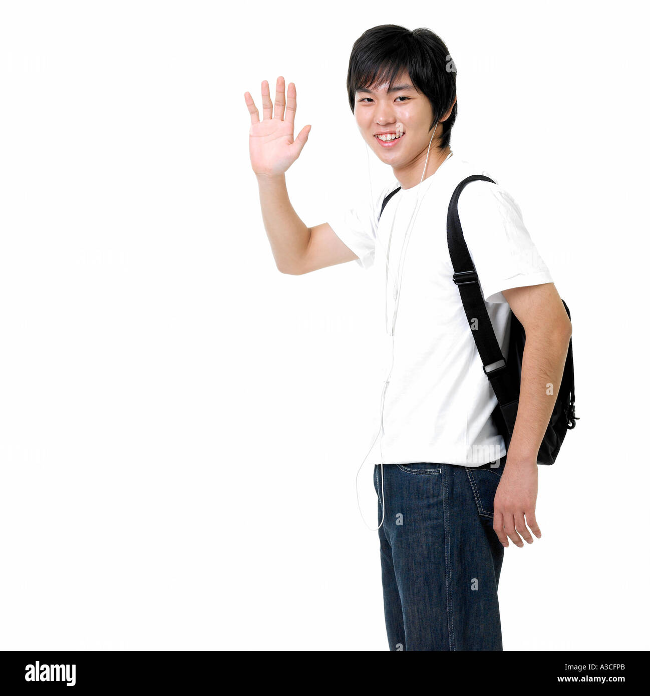 A male teenager is putting his left hand up to greet Stock Photo - Alamy