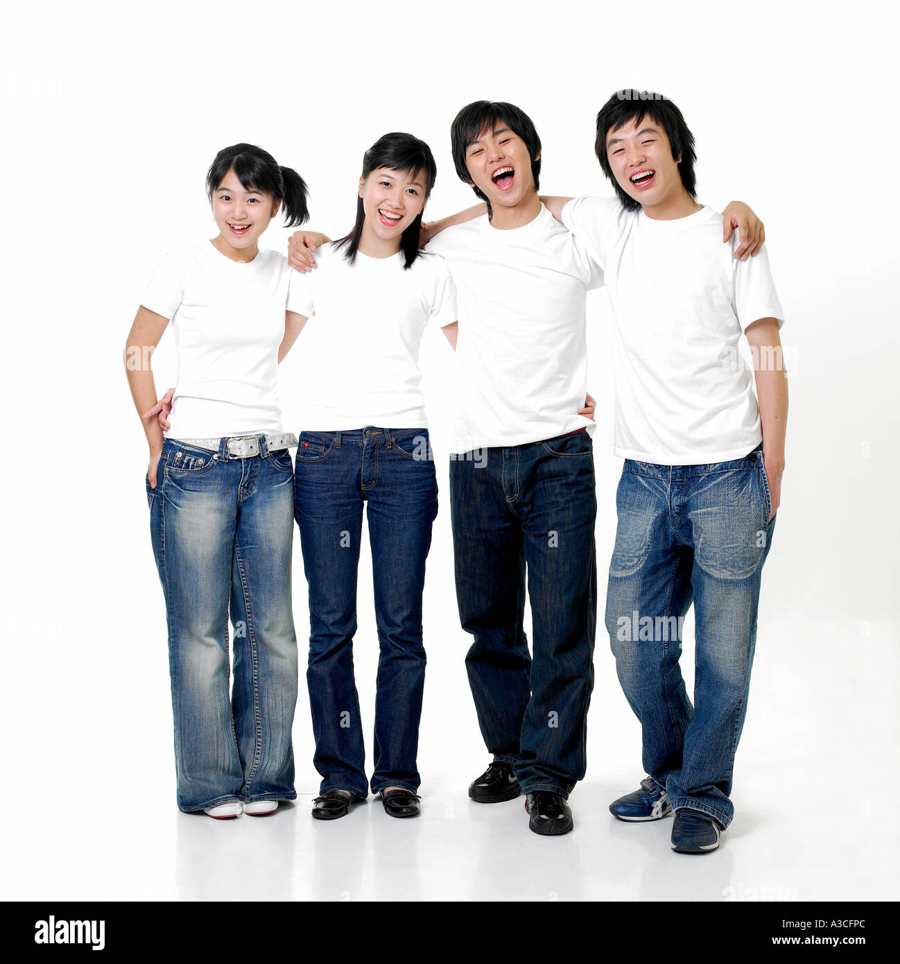 Four teenagers are putting arms around each other's shoulders Stock ...