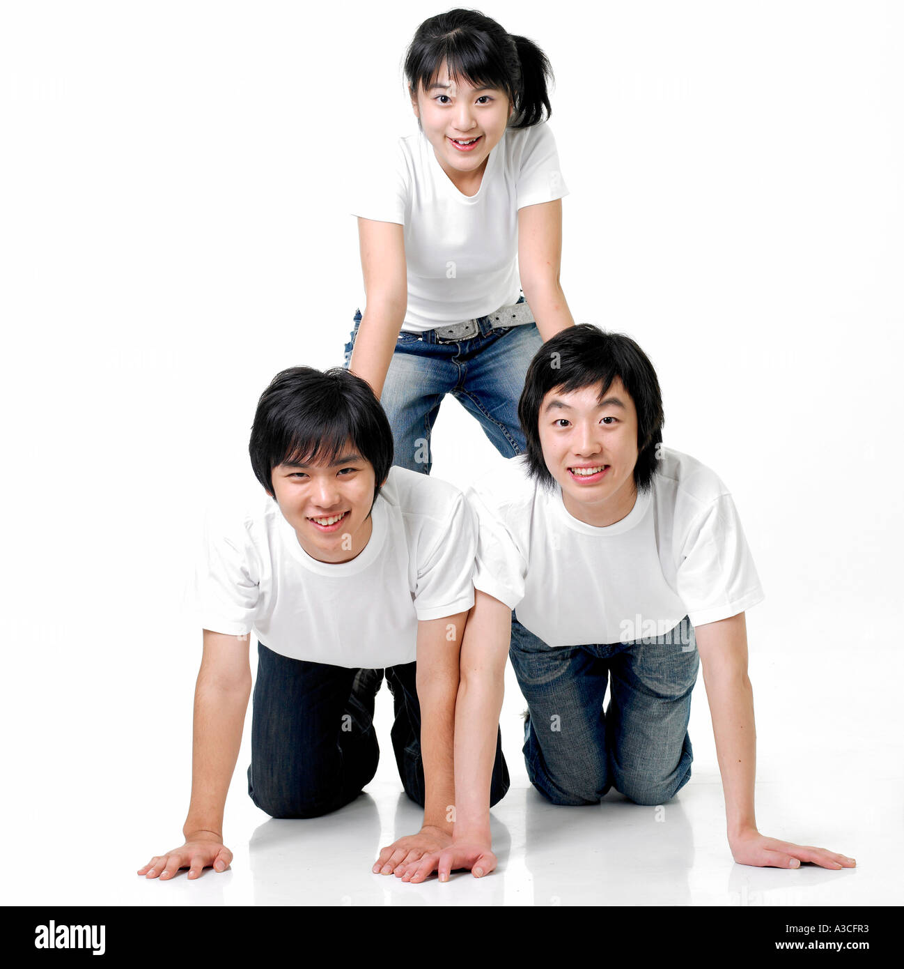 Asian man making tower hi-res stock photography and images - Alamy