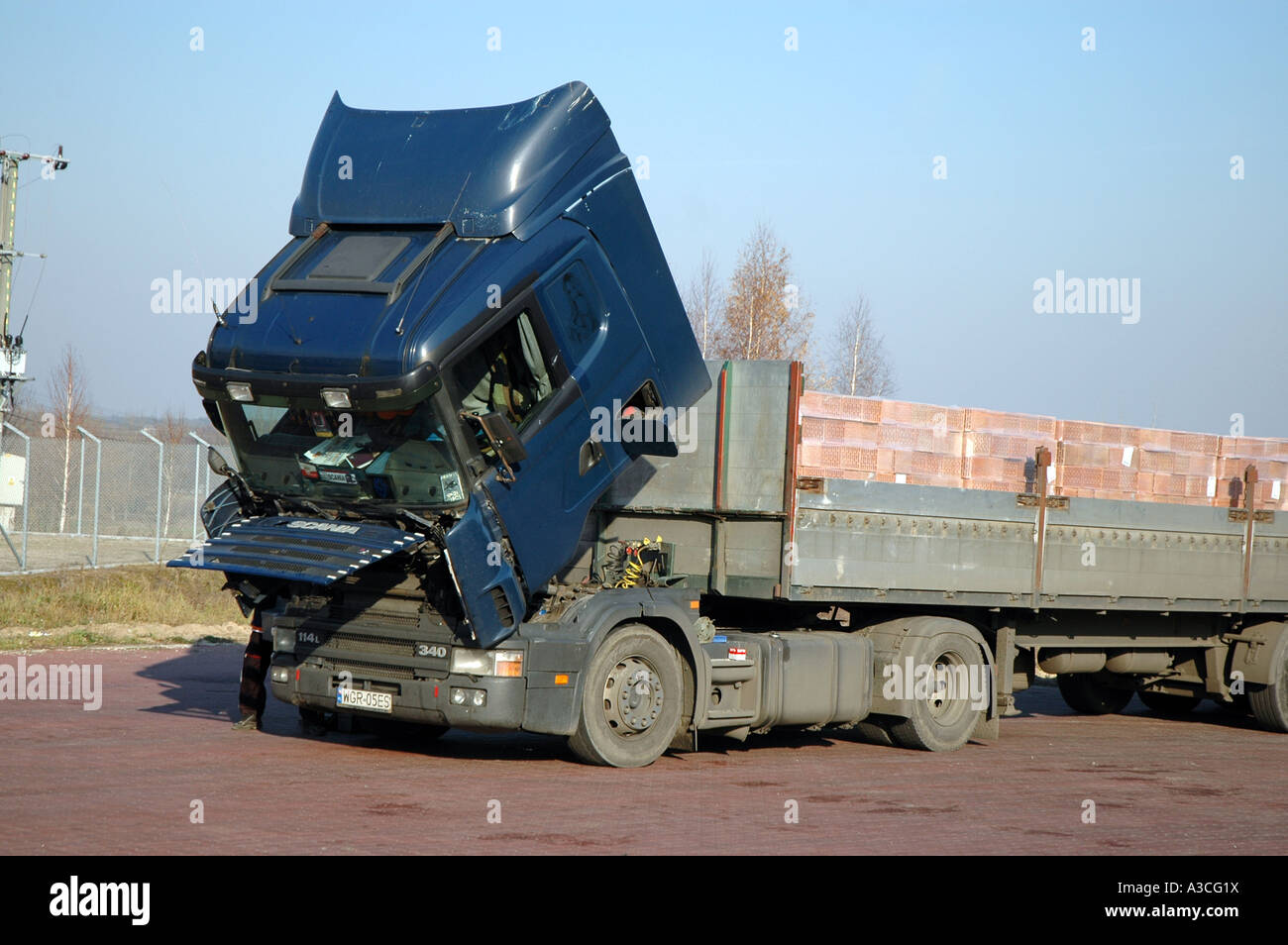 Lorry with raised cab in Poland Stock Photo - Alamy