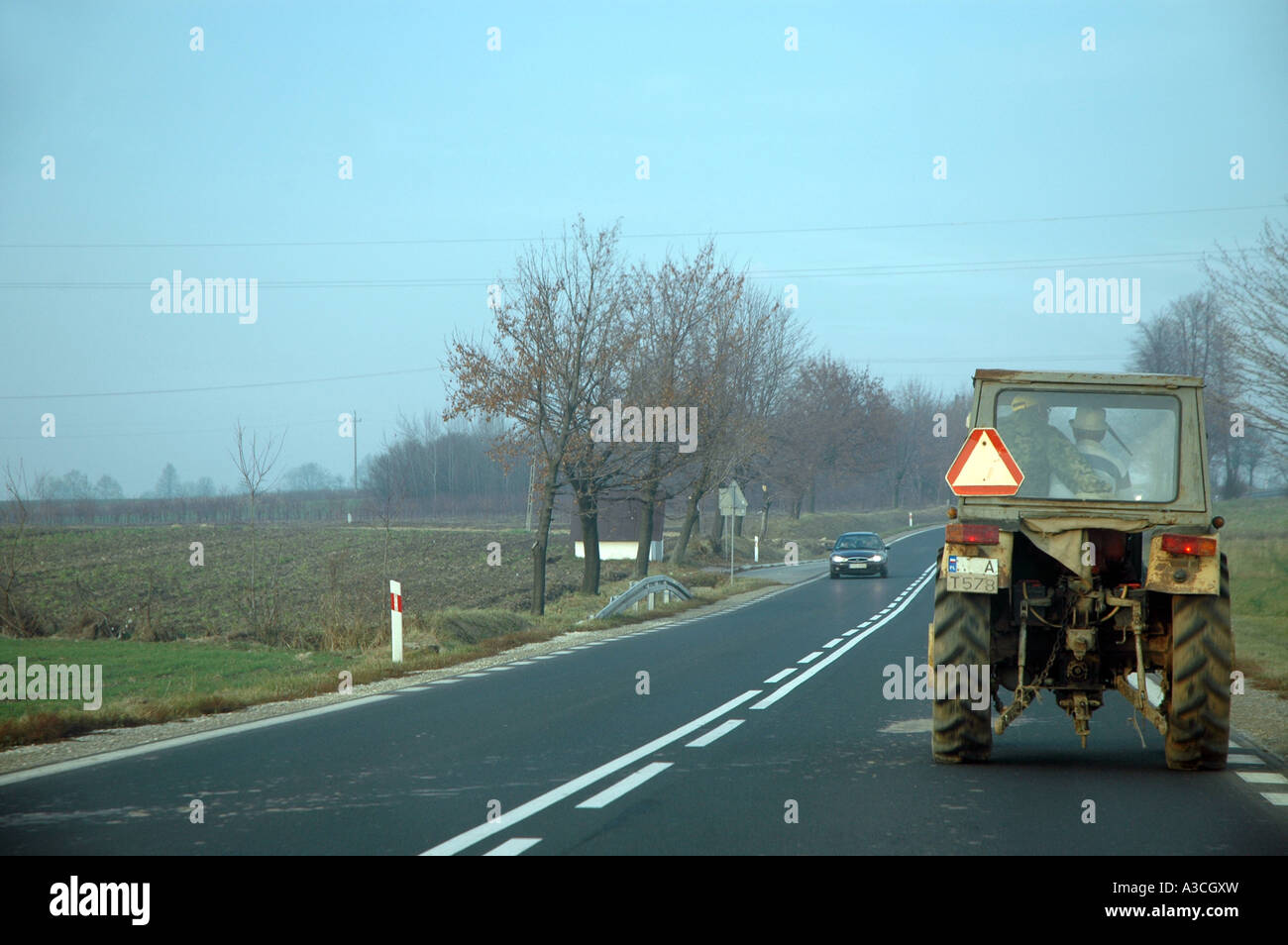 tractor on polish countryside Stock Photo - Alamy