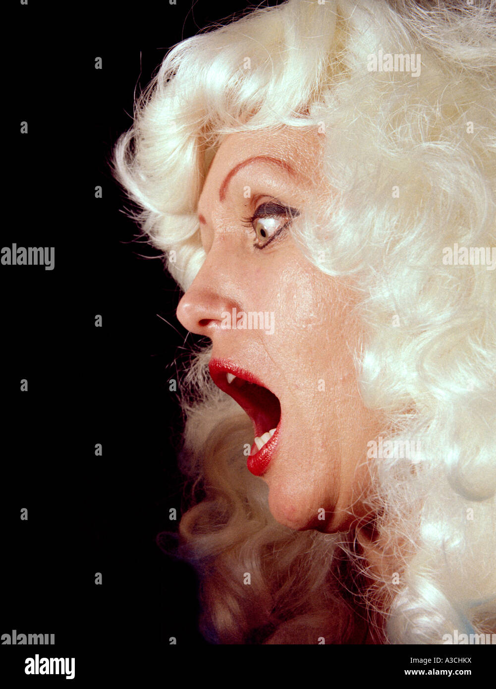 Screaming frightened woman Stock Photo - Alamy