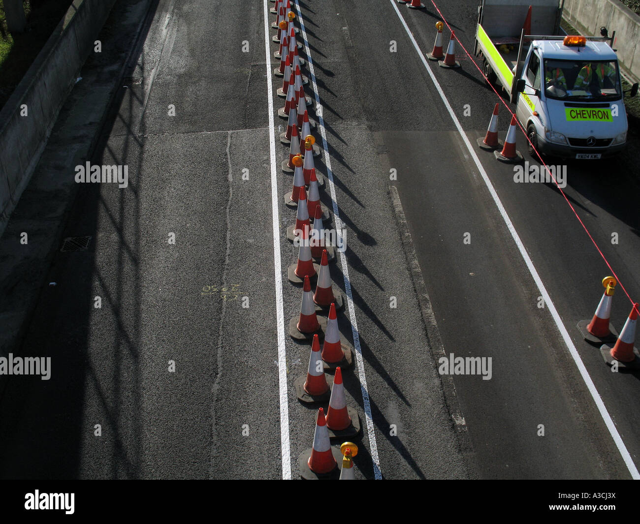 Traffic cones and highways van on duel carriageway Stock Photo - Alamy