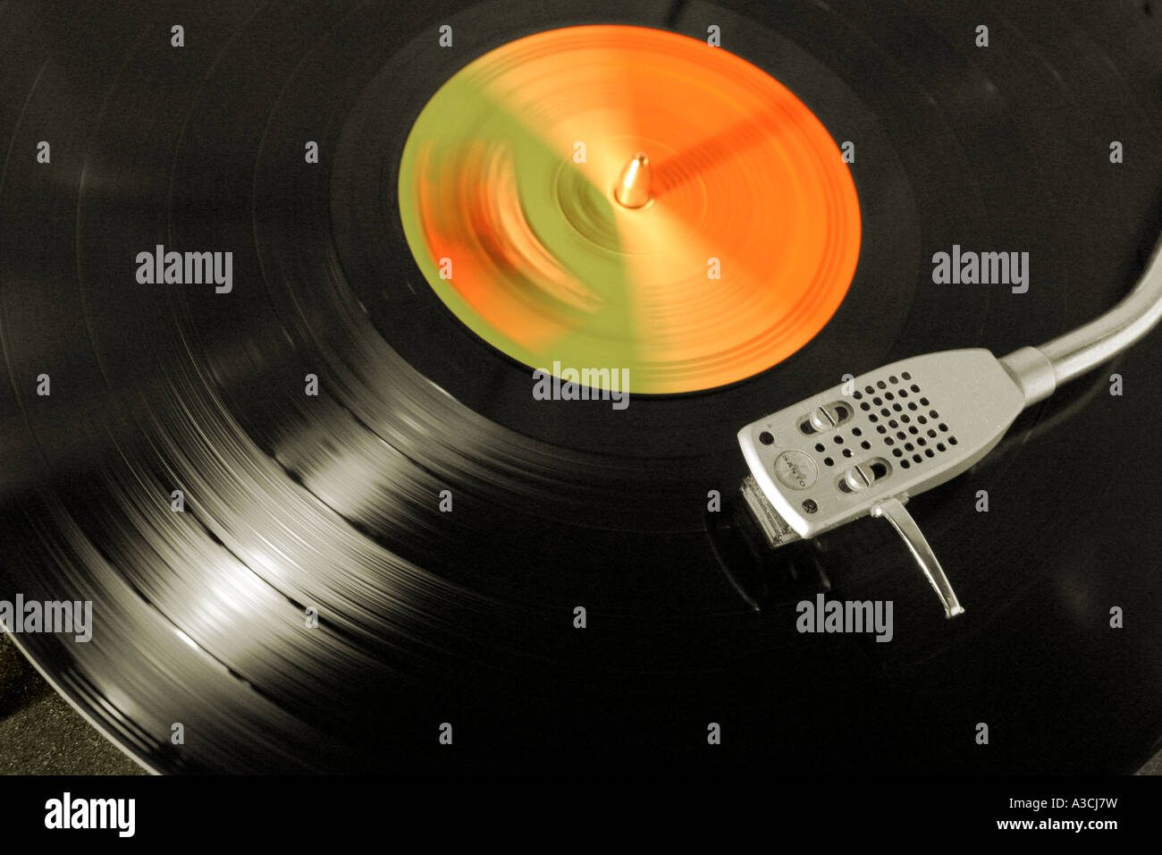 Vinyl record spinning with stylus arm Stock Photo - Alamy