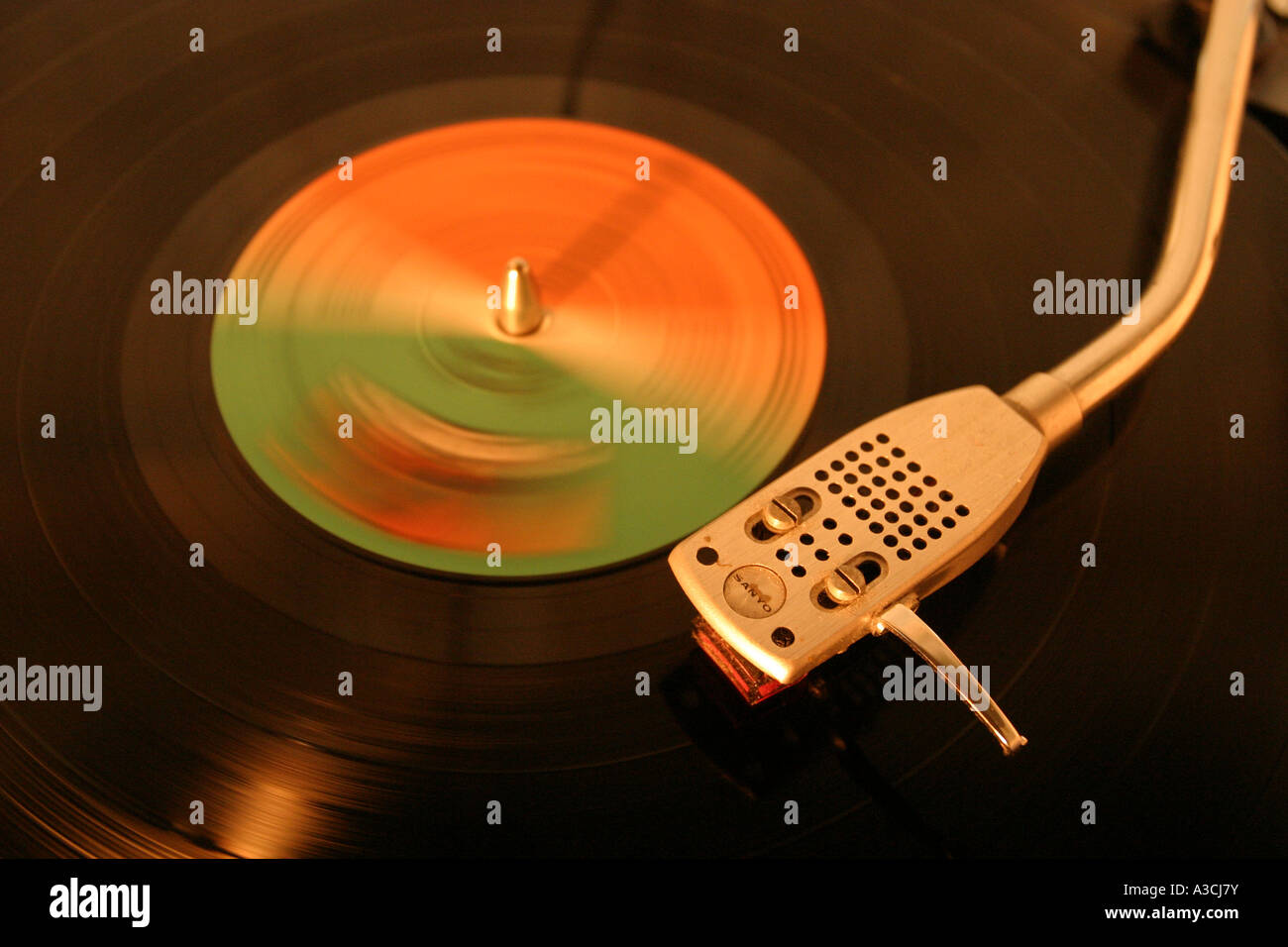 Vinyl record spinning with stylus arm Stock Photo - Alamy