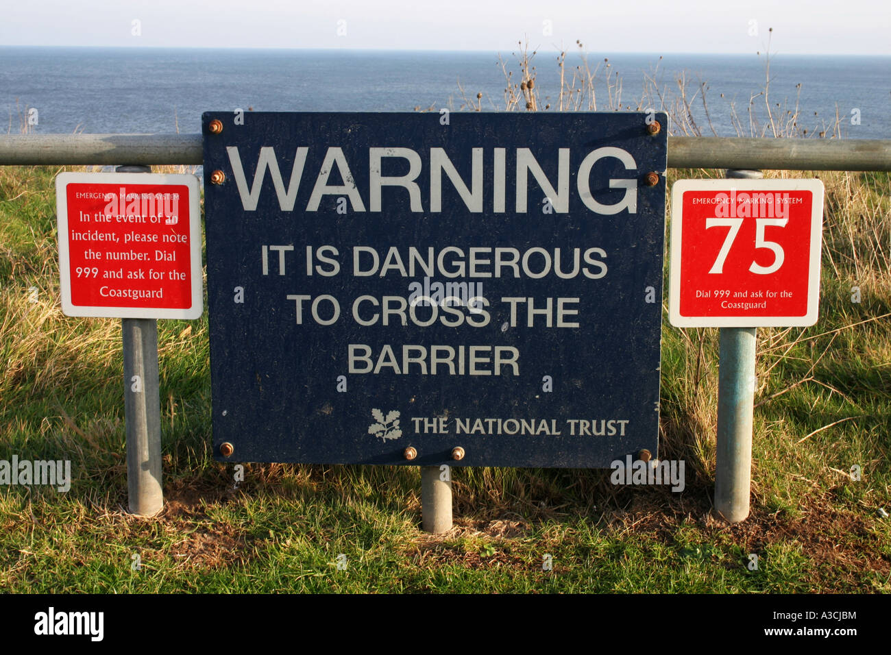 Warning it is dangerous to cross the barrier warning sign near Souter ...