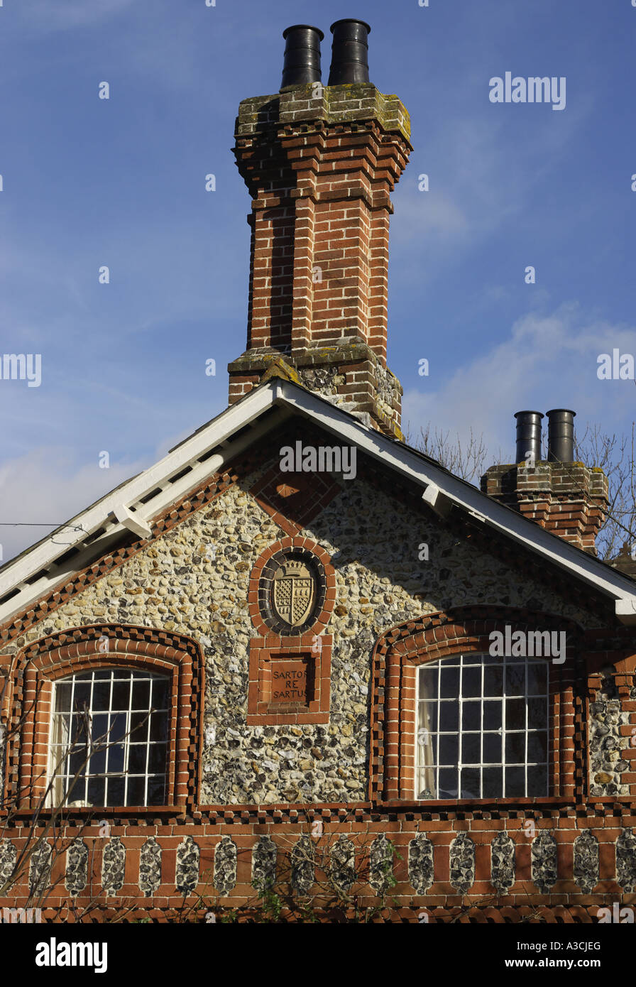windows chimneys in flint stone and brick East Horsley Surrey Stock ...