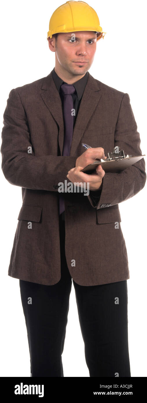 Construction site superintendent in business suit and hard hat taking ...