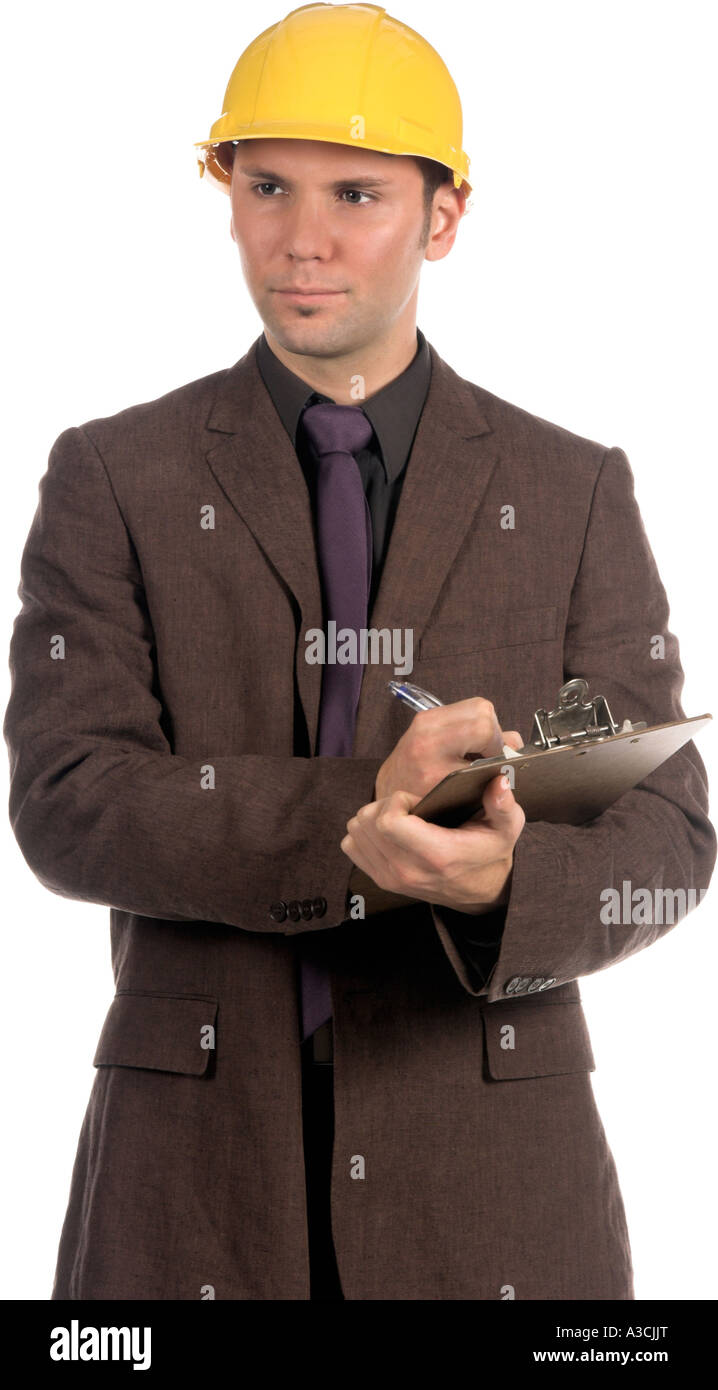 Construction site superintendent in business suit and hard hat taking ...