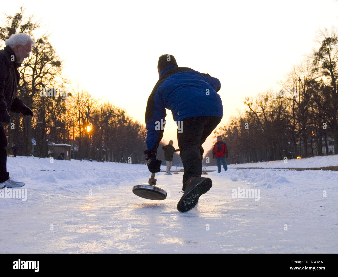 Stick shooting sports on deep winter snow Stock Photo - Alamy