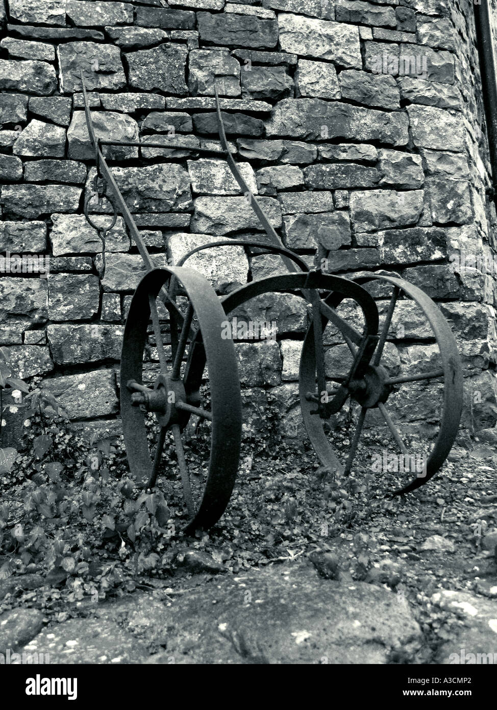 old farming equipment Stock Photo - Alamy