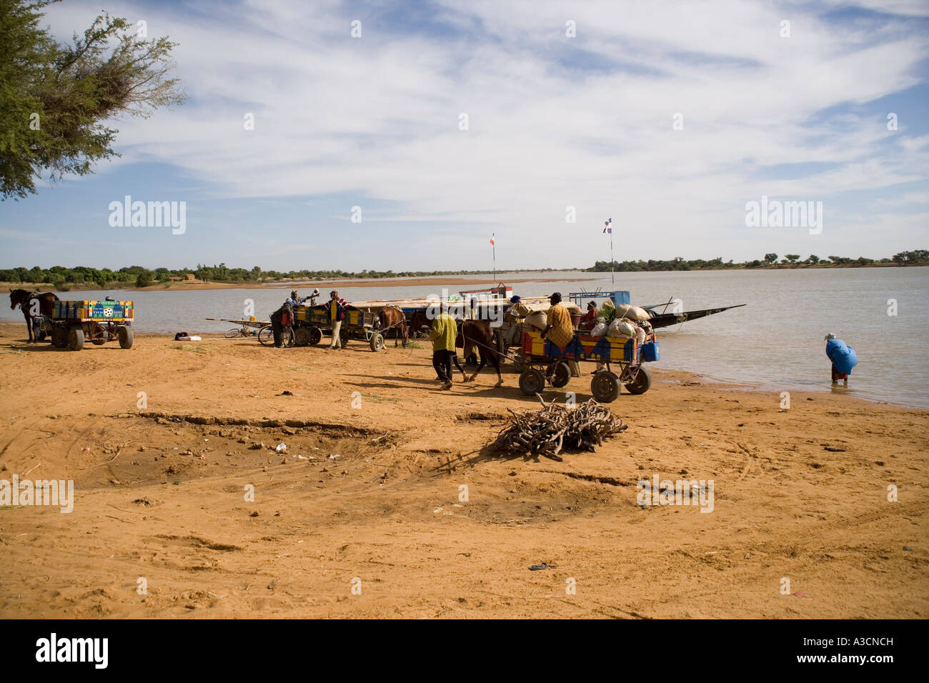 On the way across the Bani river on route to the Monday market at ...