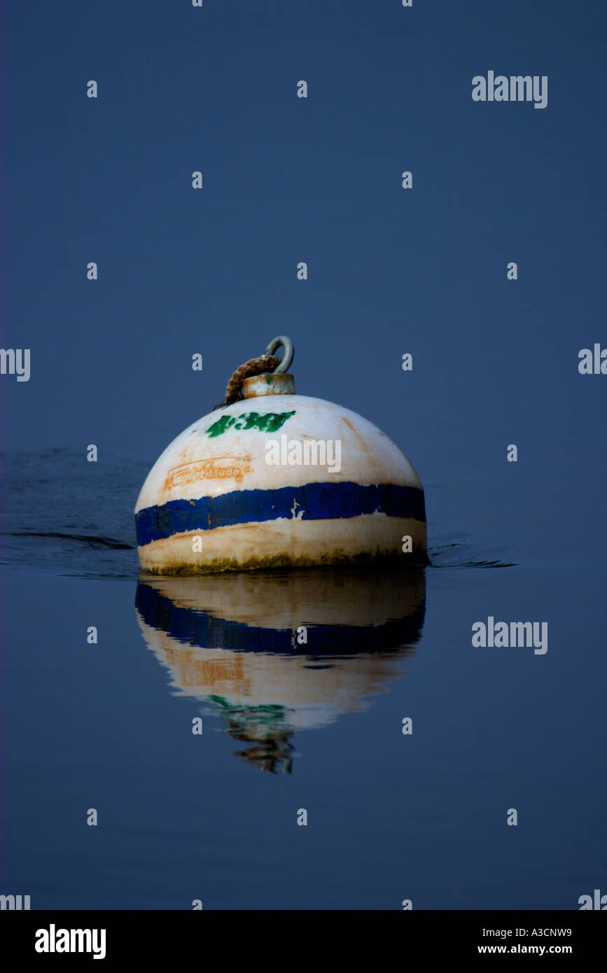 A buoy floating in the current Stock Photo - Alamy