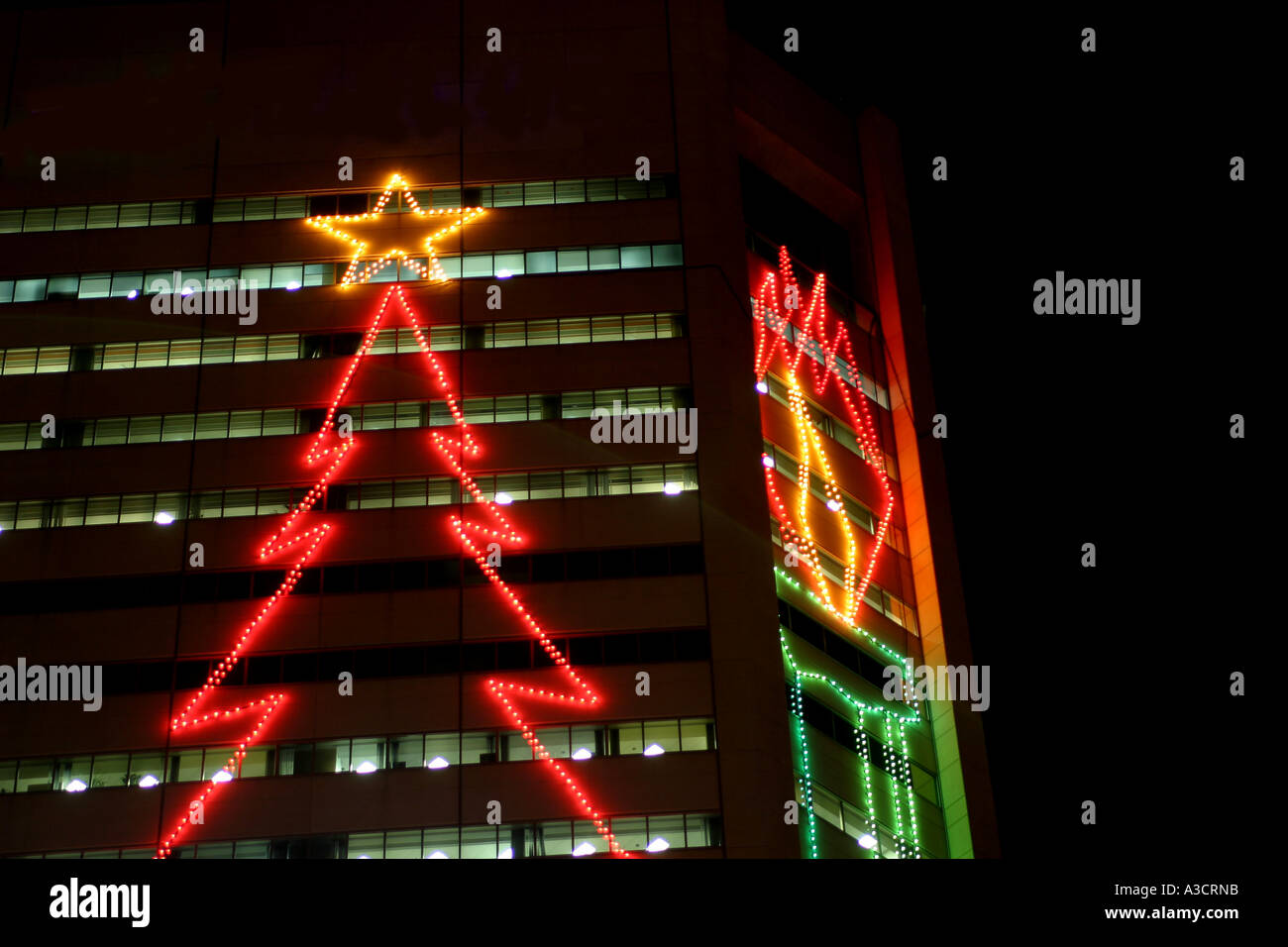 CHRISTMAS decorations on a downtown office tower Stock Photo - Alamy