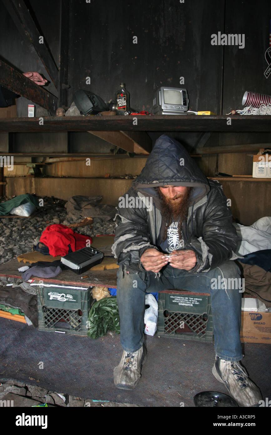 homeless men living under bridge Stock Photo - Alamy