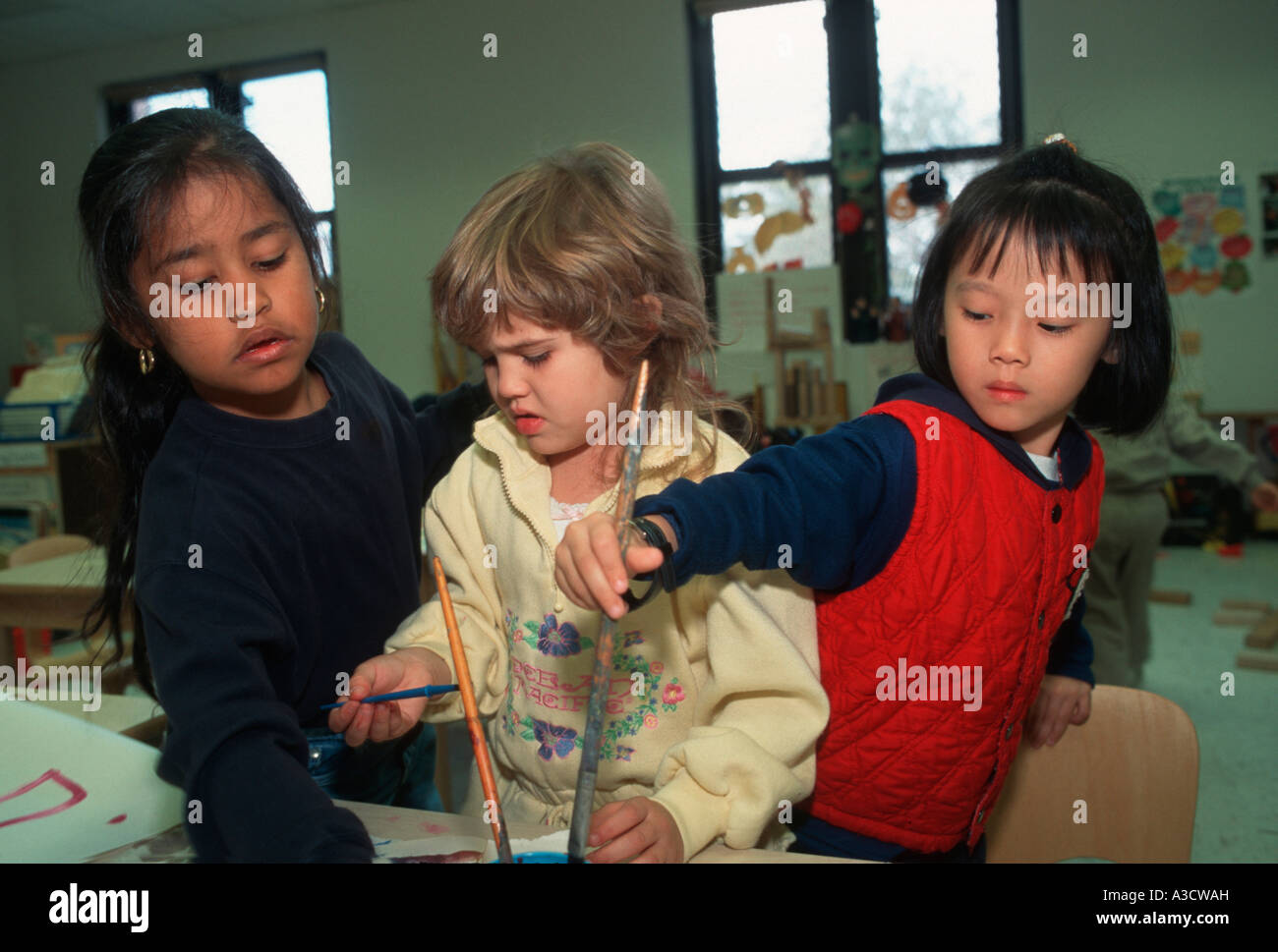 Kindergarten children doing art together in a Brooklyn NY public school ...