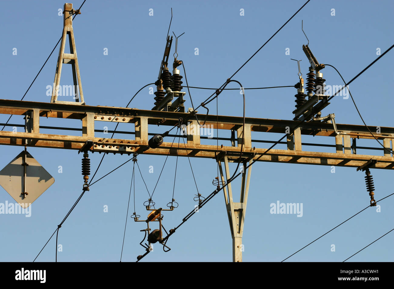 Overhead train electricity cables Stock Photo - Alamy