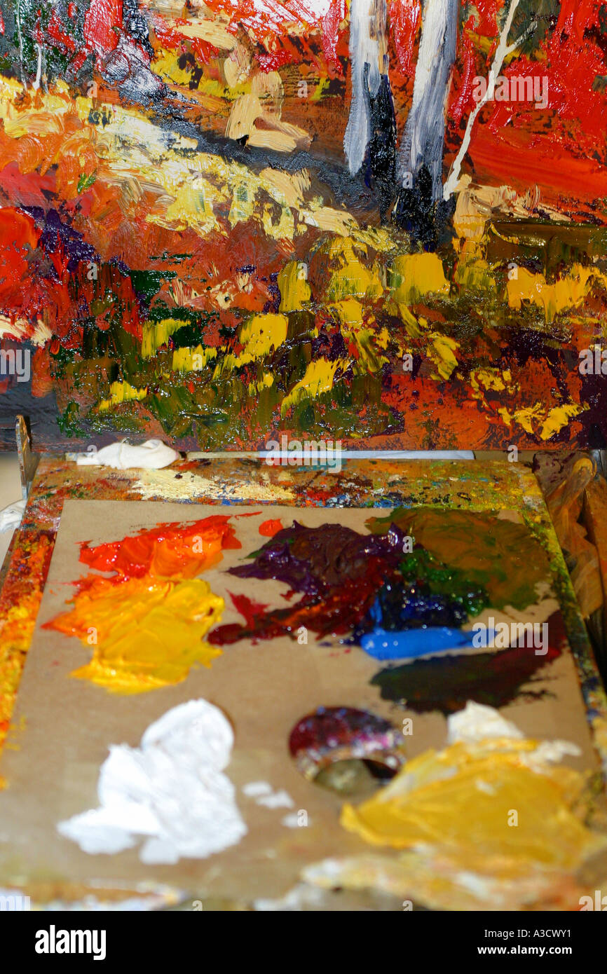 Artist at work doing an oil painting Stock Photo - Alamy