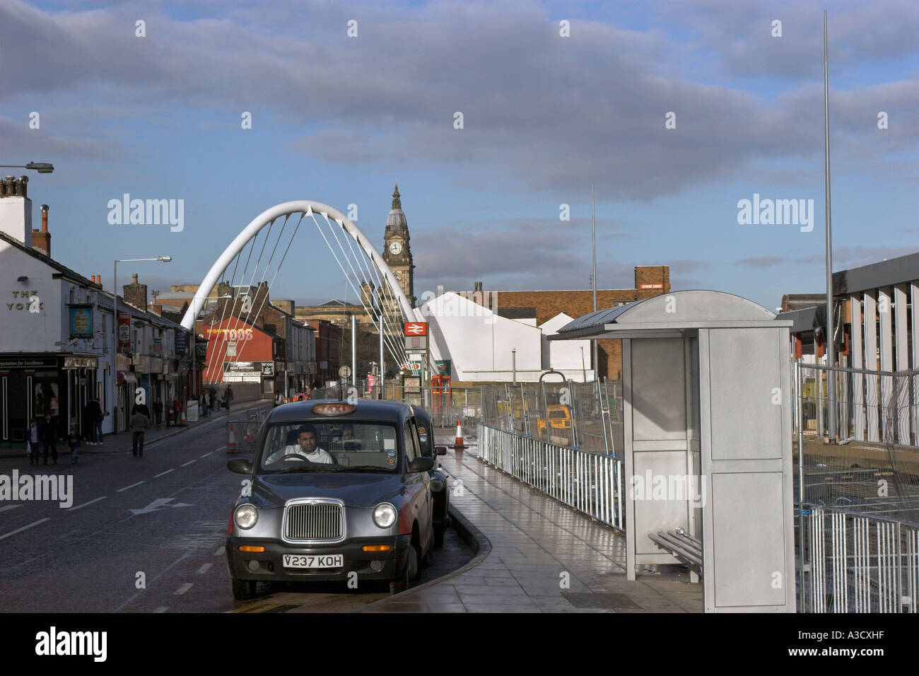 Taxi rank and new bridge on Newport Street in Bolton Stock Photo - Alamy
