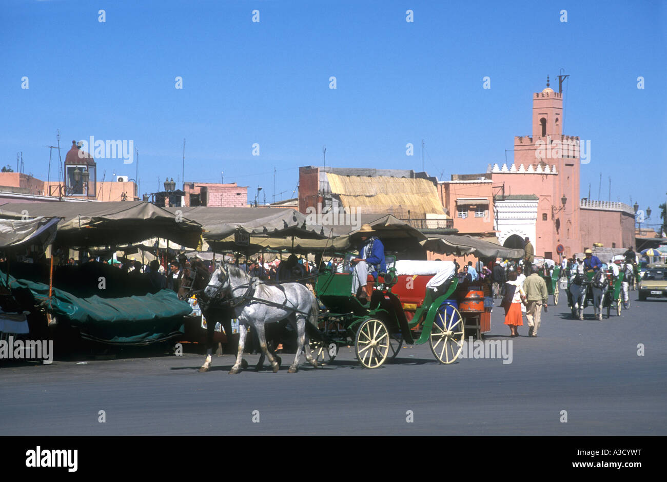 A Caleche or horse drawn carriage in the Place Djemaa el Fna Marrakesh ...