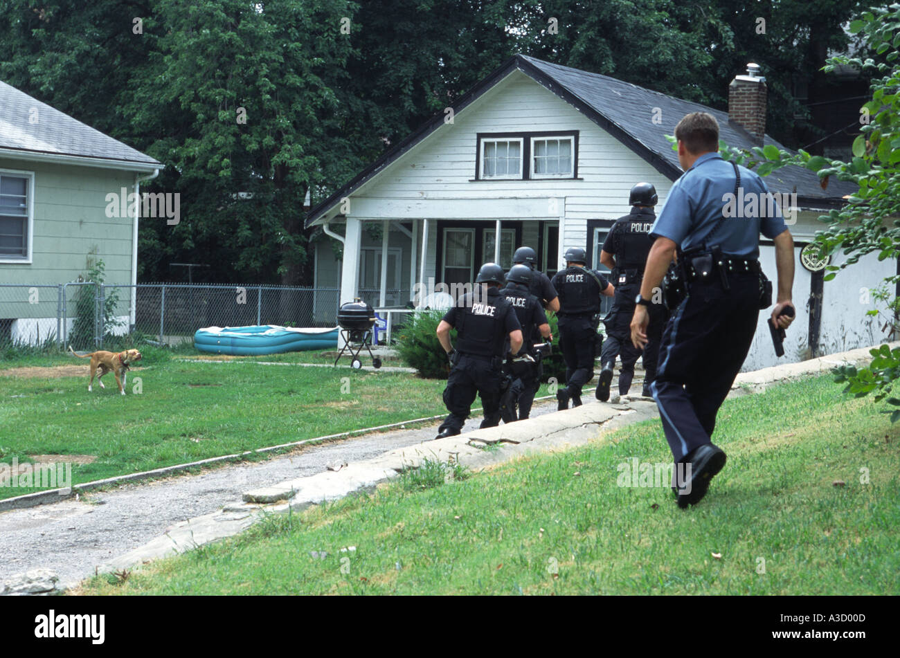 SWAT TAC Police unit approaching suspect s house. Kansas City, MO, PD ...