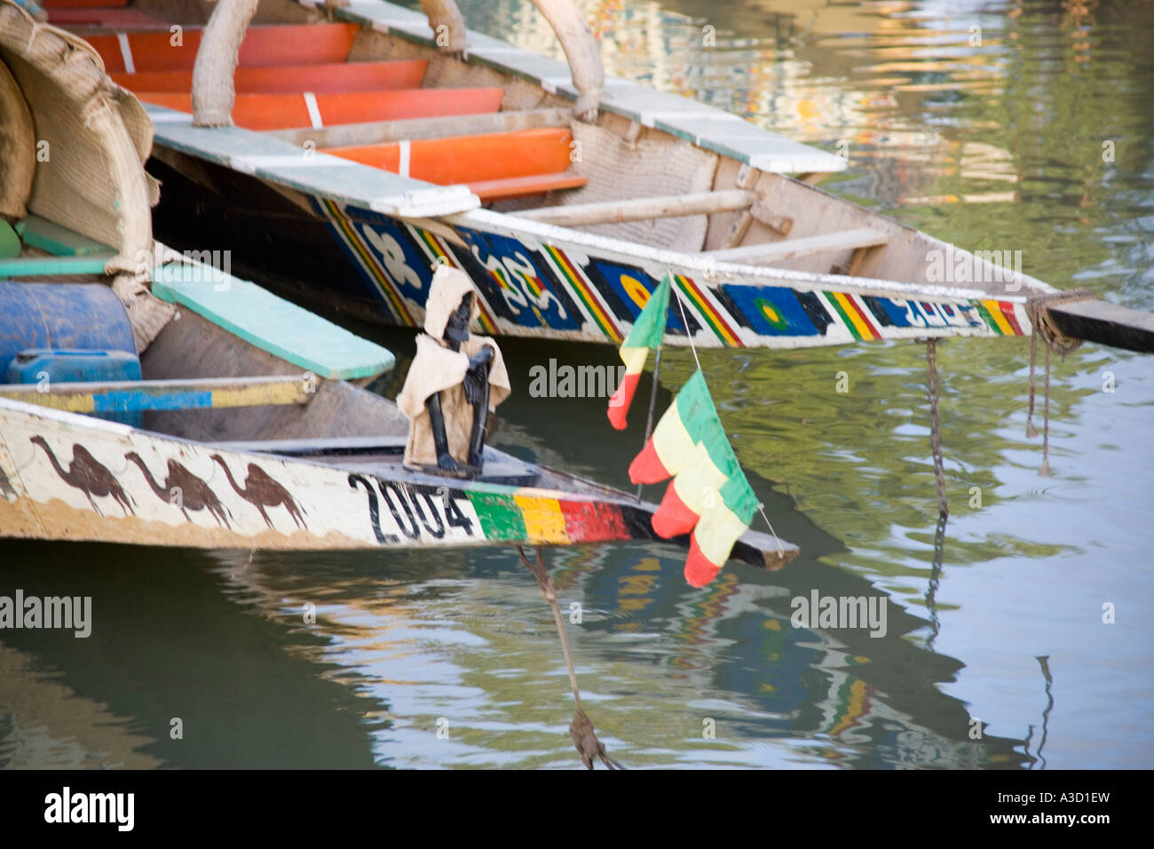 Pirogue wooden canoes on the Niger river at Korioume the port of ...