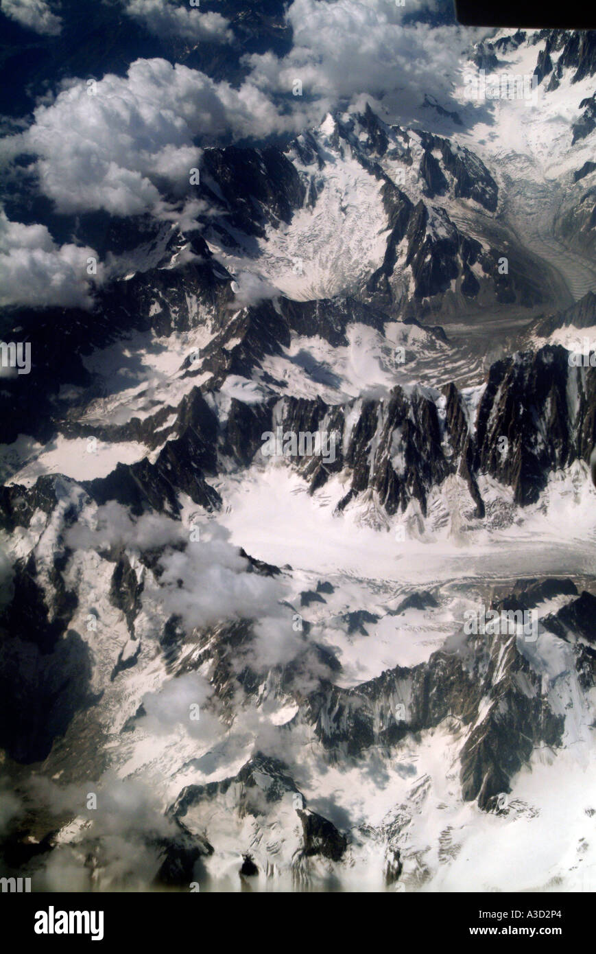 Flying over the Alps France Mont Blanc and Chamonix below Stock Photo ...