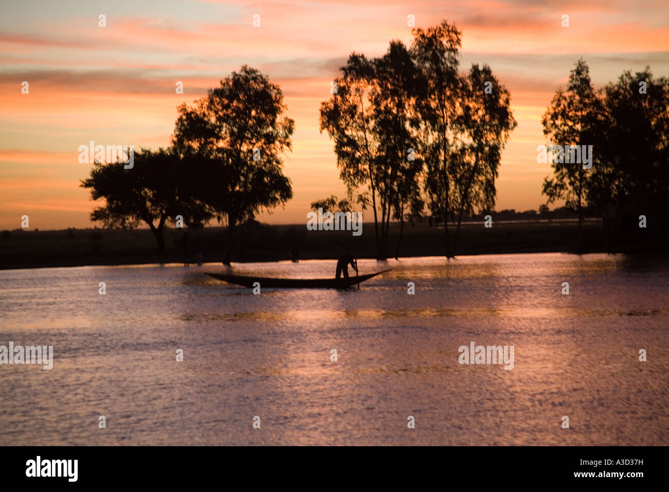 Pirogue canoe by Korioume the port of Timbuktu on the Niger river in ...