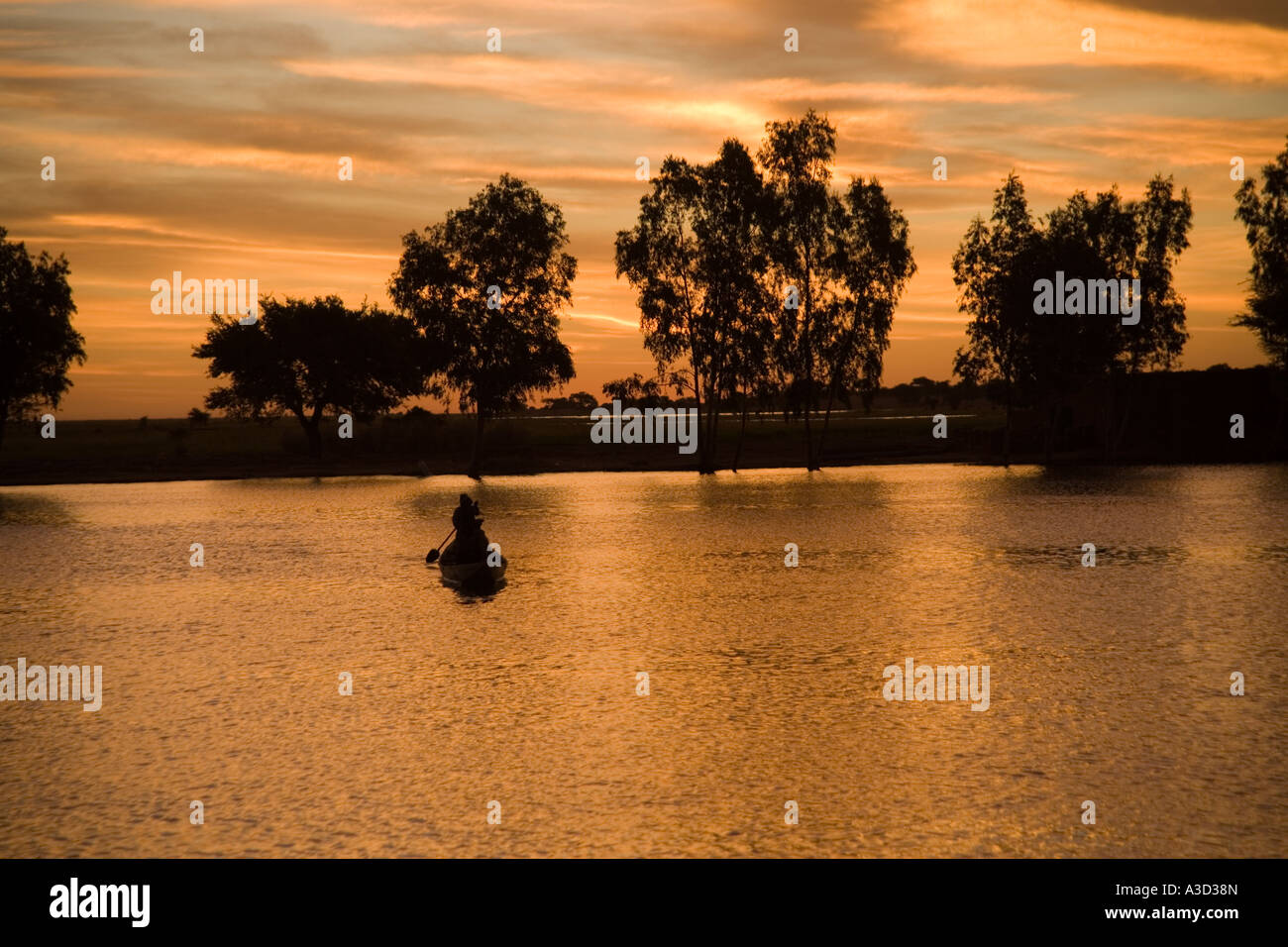 Pirogue canoe by Korioume the port of Timbuktu on the Niger river in ...