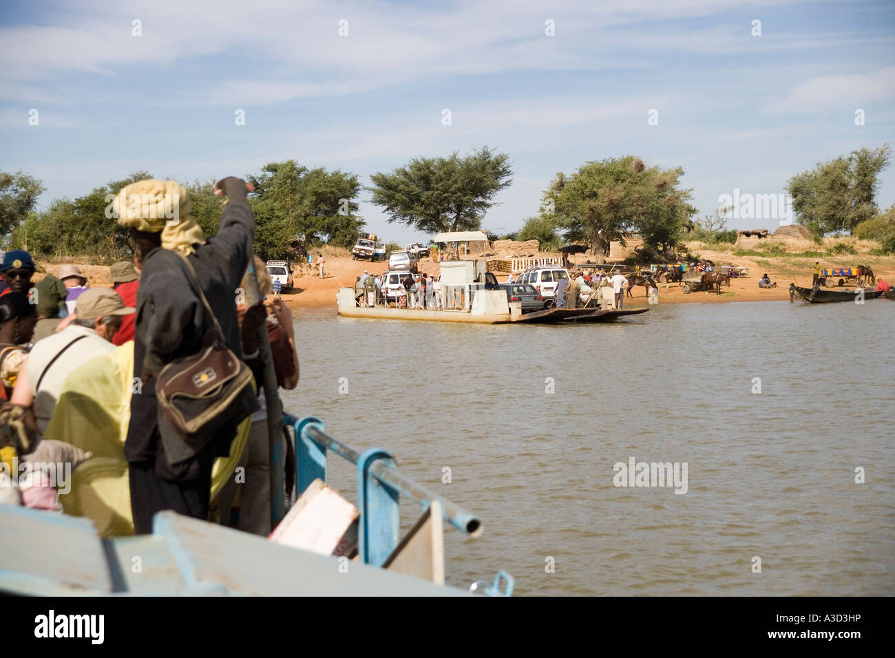 People on the ferry across the Bani river on route to the Monday market ...