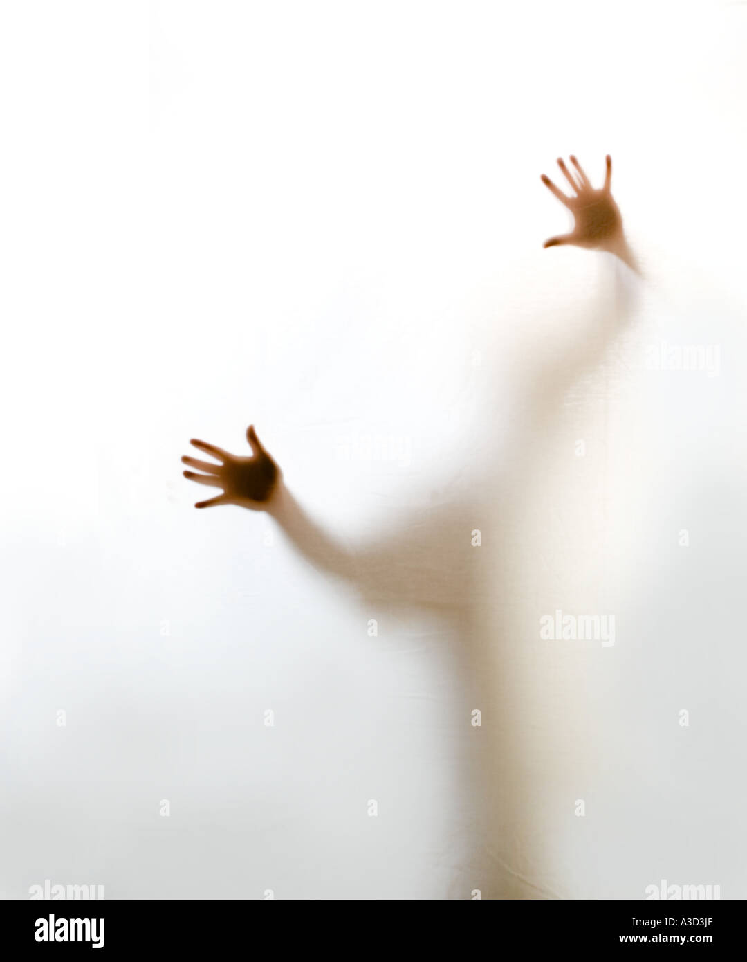 Hands trying to reach through a barrier Stock Photo - Alamy