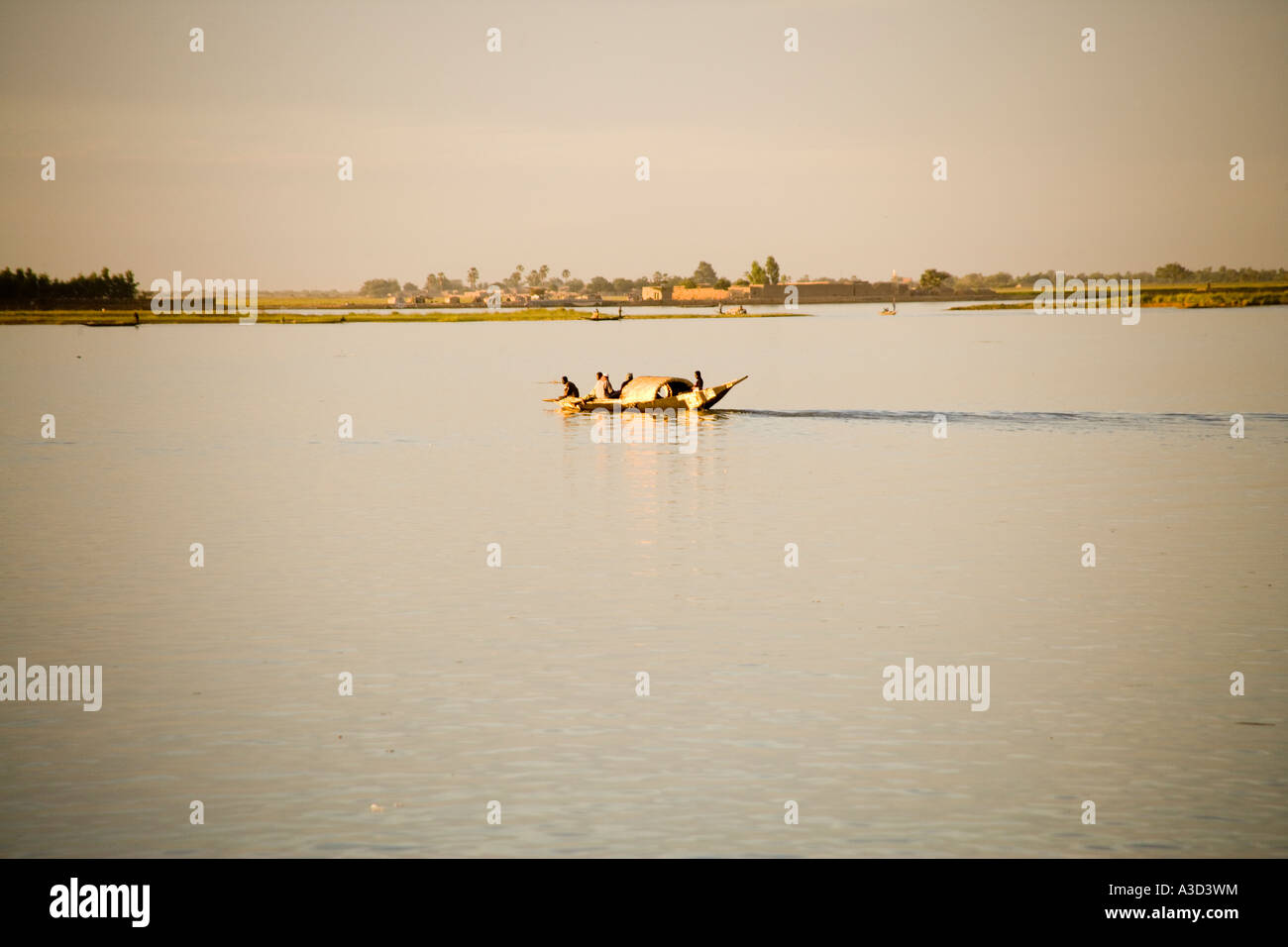 Fishing from a pirogue canoe on the Bani river near the town of Mopti ...