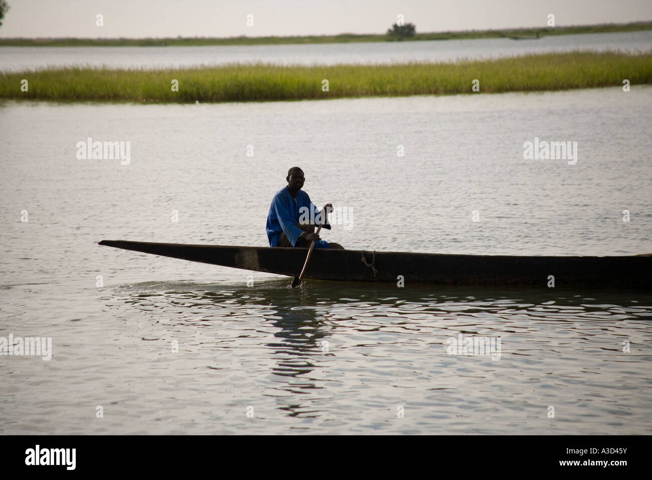 Pirogue wooden canoe on the Niger river at Korioume the port of ...
