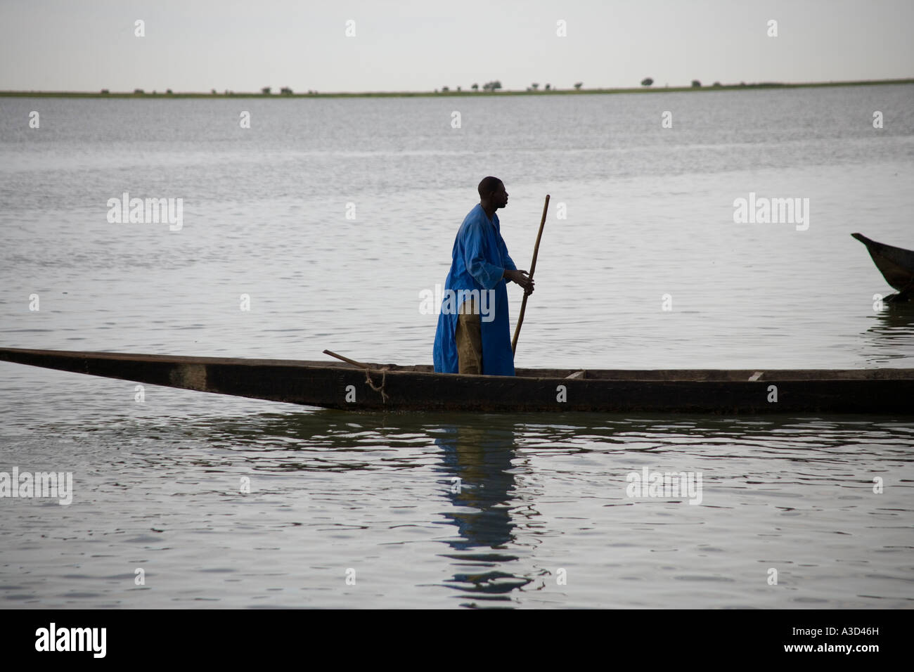 Pirogue wooden canoe on the Niger river at Korioume the port of ...
