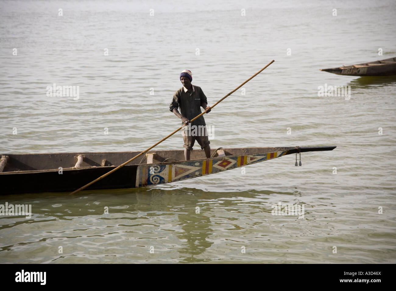 Pirogue wooden canoe on the Niger river at Korioume the port of ...