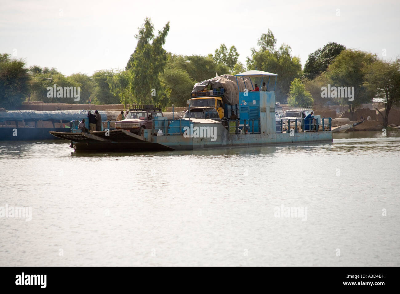 The Niger river ferry arrives at Korioume, the port of Timbuktu, Mali ...