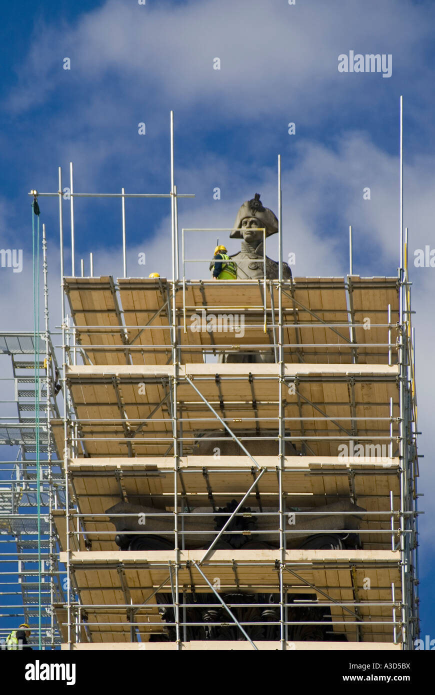 Close up top of Lord Nelsons column & scaffolding as workers carry out ...
