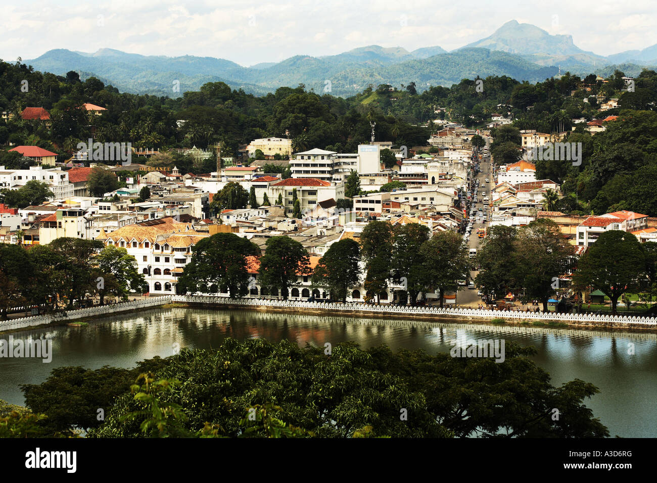 Scenic landscape view of the city of Kandy with lake in foreground and ...