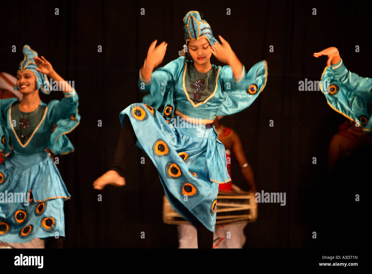 Portrait of world famous Kandy dancers in action performing on stage in ...