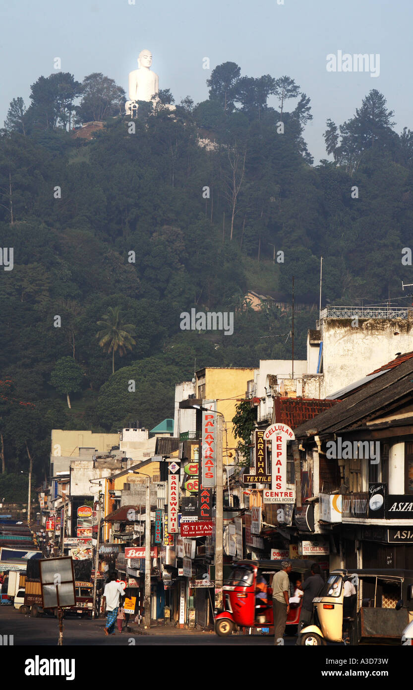 View of Kandy street with hillside and Christ statue in the background ...